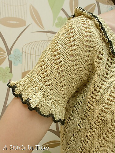 Ravelry: Frilly Jumper pattern by Susan Crawford