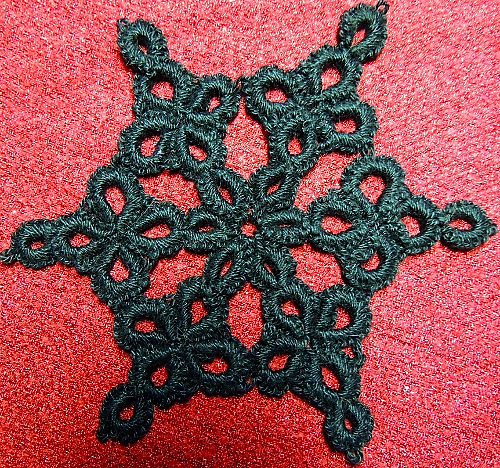 Ravelry: Cro-Tat Snowflake Coaster pattern by Simone Roeder