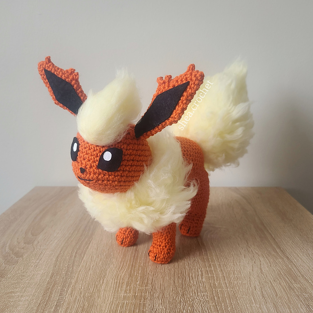 Ravelry: Pokemon Flareon pattern by Kayla Shea.