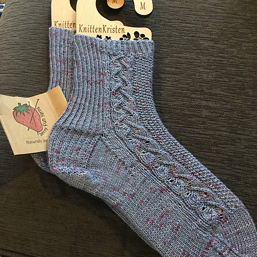 Ravelry: Braided Path Socks pattern by KnittenKristen