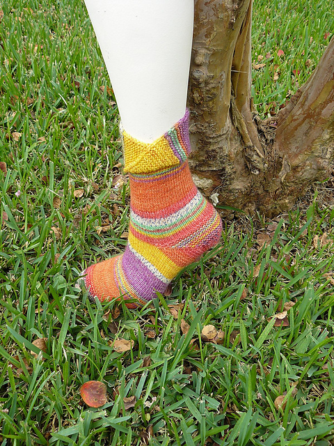 Ravelry: Here Comes the Sun Socks pattern by Emily Griffin