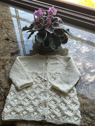 Ravelry: Bouquet de fleurs cardigan pattern by Anne B Hanssen
