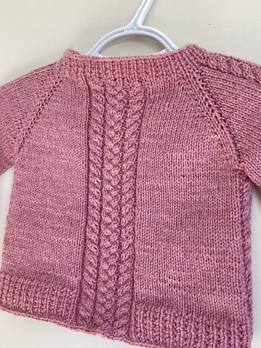 Ravelry: Simple Raglan Cable Sweater pattern by Lara Simonson