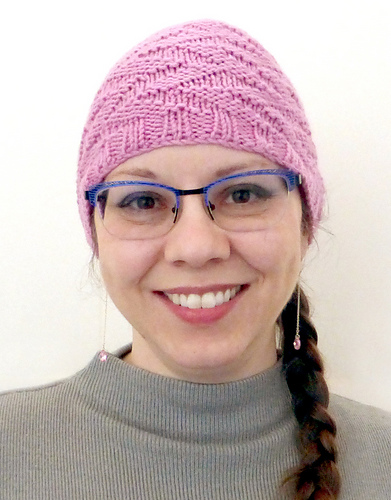 Ravelry: Temporal Wingnut Hat pattern by Caroline Steinford
