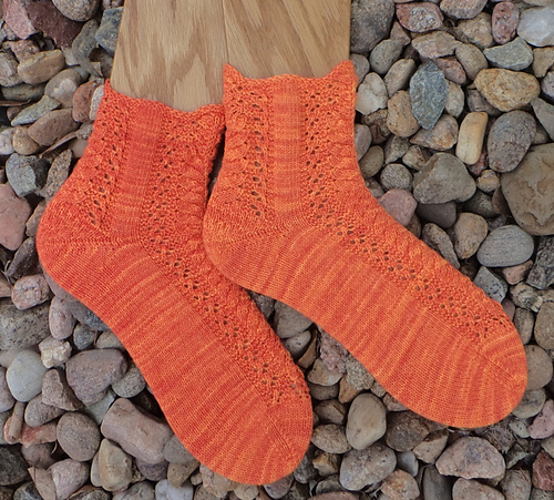 Ravelry: Raining Fire Socks pattern by Laura Fahlin