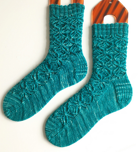 Ravelry: Tilly Lace Socks pattern by Suzie Sparkles