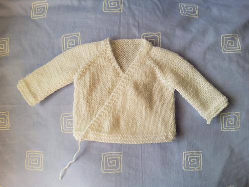 Ravelry: Crossover Baby Cardigan pattern by marianna mel