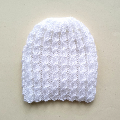 Ravelry: Faux Cable Baby Hats pattern by marianna mel