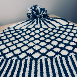 Ravelry: The Criss Cross Hat pattern by Polar Bear Knits