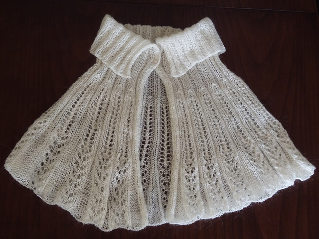 Ravelry: Lacy pleated mini cloak pattern by Nevin Dermenci