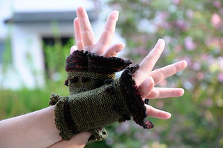 Ravelry: Nessie Armstulpen pattern by Anja Karina Kloth