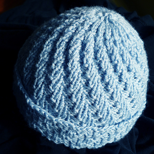 Ravelry: Spiral Rib Baby Hat pattern by Chris Beck