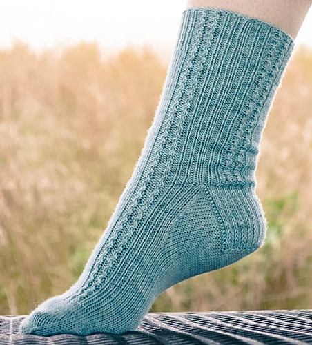 Ravelry: Ripple Ribbed Socks pattern by Susie White