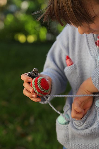 Ravelry: Pocket Surprise Cardi (with 8 tiny toys) pattern by Rian Anderson