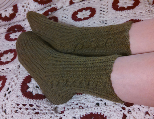 Ravelry: Cabled slip stitch socks pattern by Anna Lindmark