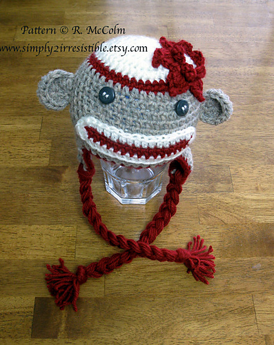 Ravelry: Sock Monkey Beanie with optional Earflaps pattern by Ruth McColm