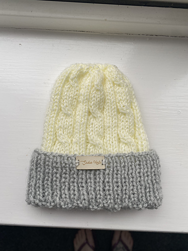 Ravelry: Cabled Baby Hat pattern by marianna mel