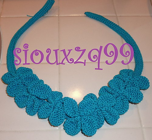 Ravelry: Crochet four petal flower pattern by Maria Isabel