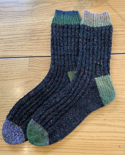 Ravelry: Twisty Mock Cable Socks pattern by Jess McCaughey