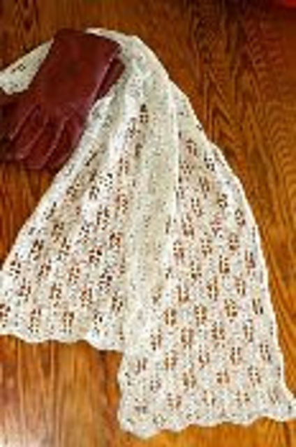 Ravelry: Suri Simply Stunning Pine Cone Lace Scarf pattern by Sue Simonton