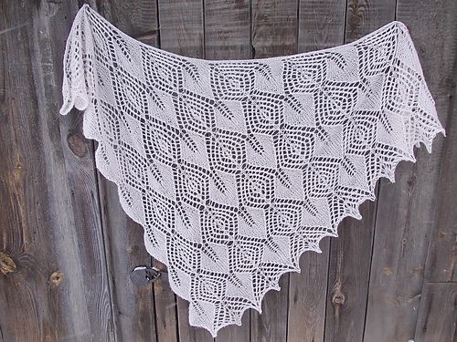 Ravelry: Fragile Mantling Shawl pattern by Jolanta Zwierzchowska