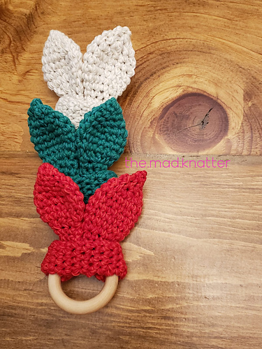 Ravelry: Bunny Ear Wooden Ring Teether pattern by the madknatter