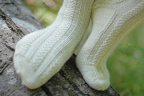 Ravelry: Fascine Braid Socks pattern by Tiennie