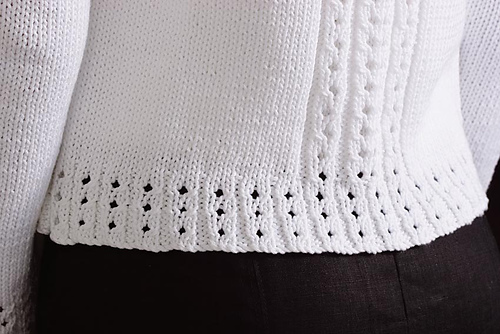 Ravelry: Eyelet and Ruffle Cardigan pattern by Ann McCauley