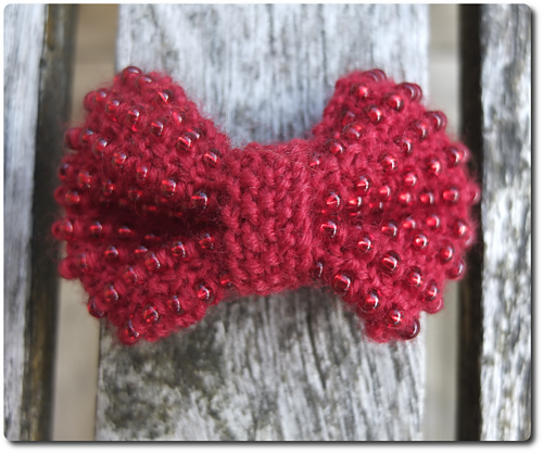 Ravelry: Beaded bow pattern by The Knitty Nerd