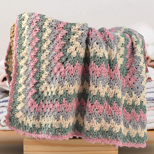 Ravelry: Rosewater Center Out Blanket pattern by Maggie Haskell